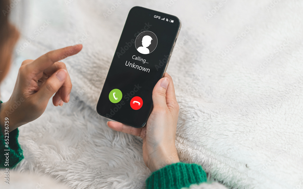 Human use smartphone with incoming call from unknown number, spam ...