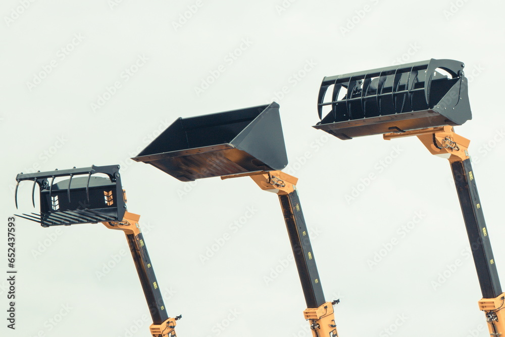 Loader machine for transport bales of straw and shovel of excavator or ...