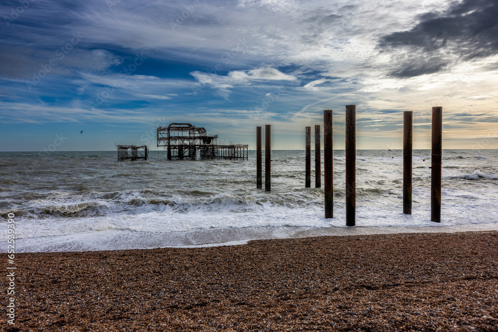 Stock-Foto „Burnt Brighton West Pier, at sunset. The Pier was built in ...