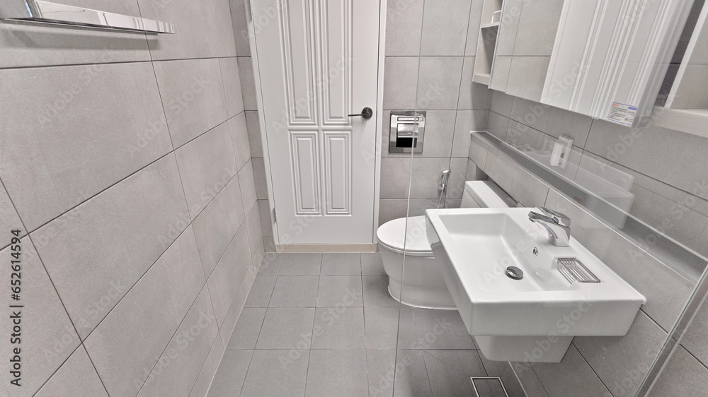 The most common bathroom layout is a toilet with a sink and a shower ...