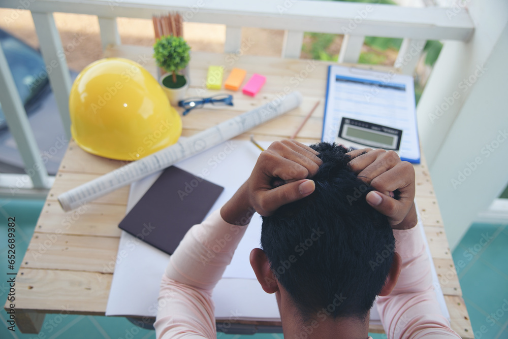 Asian young engineer man stress and failure in architecture project ...
