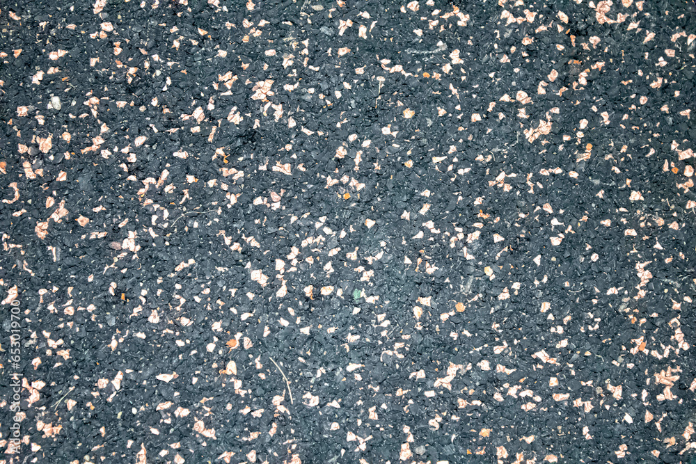 Texture of a rubber crumb for stadium. Rubber asphalt. Resilient ...