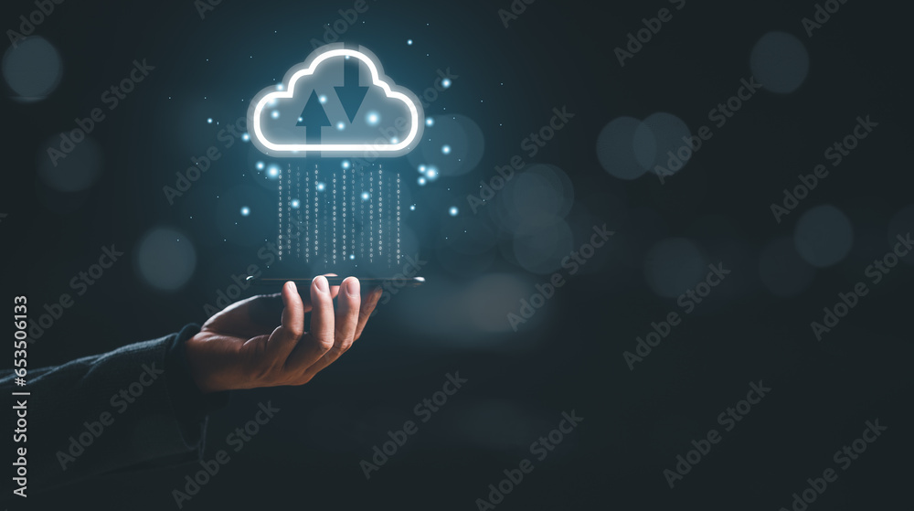 Hand holding mobile smart phone with virtual cloud computing to transfer data information and ...