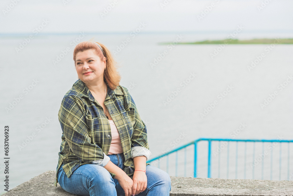 Plus size European or American mature woman at city, enjoy the life ...