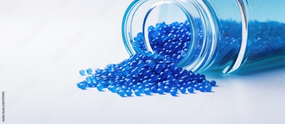 Blue pearlescent masterbatch granules for plastic products shown in a ...