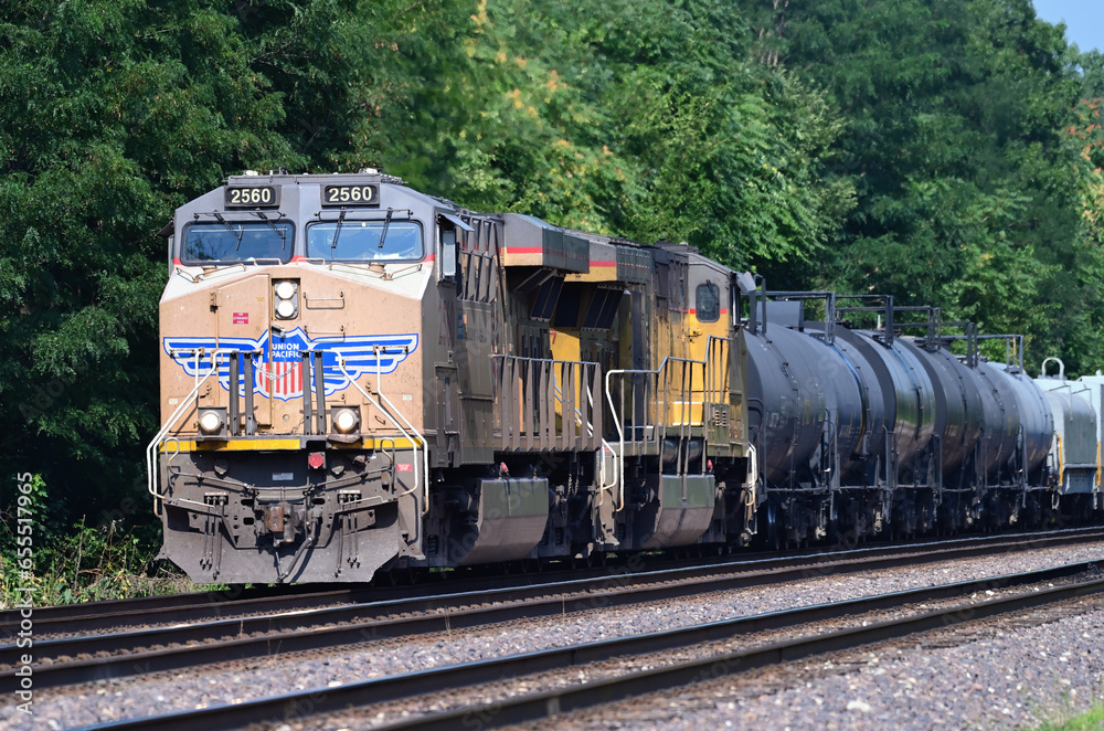 Two locomotives lead a Union Pacific Railroad freight train on its ...