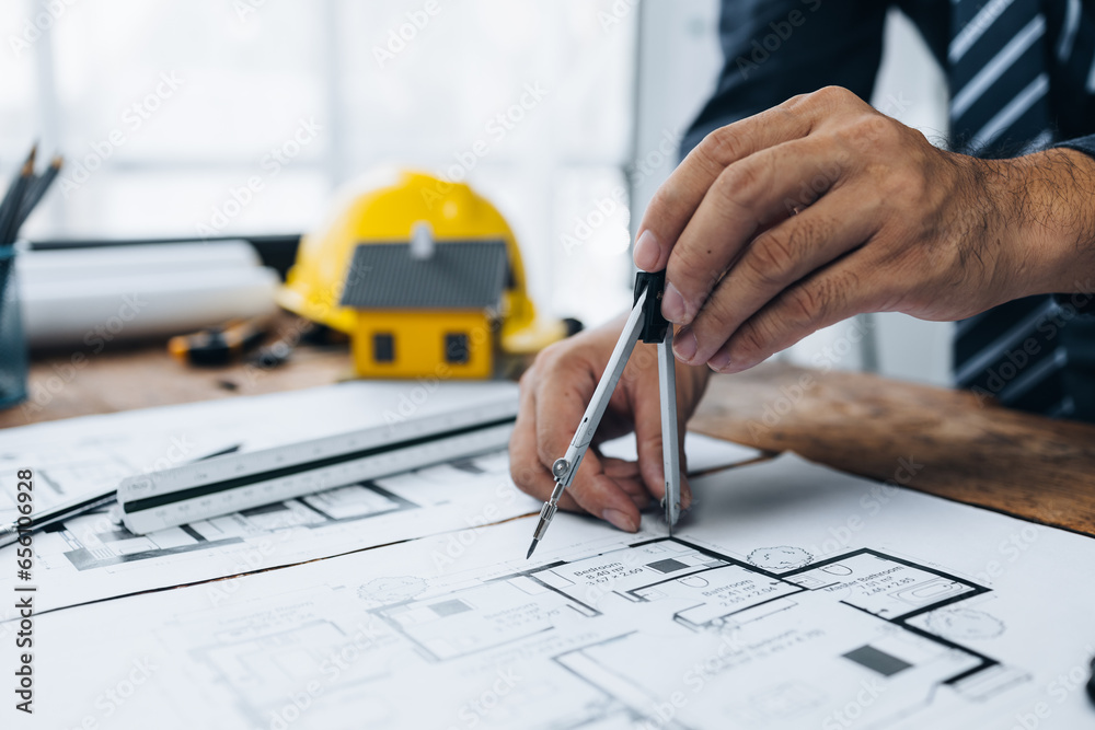Architects sketch and edit real estate building plans, design buildings ...