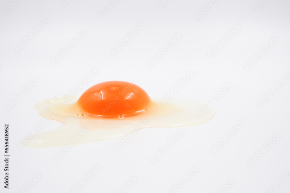 One raw chicken egg with yellow yolk and clear white egg in three ...