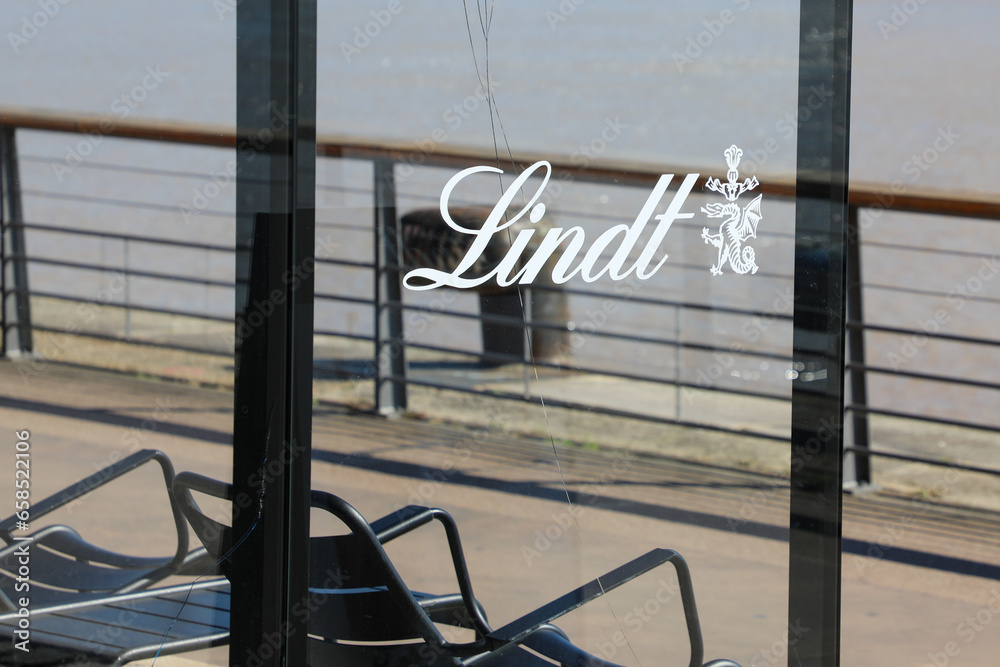 Lindt logo sign and text brand front of store swiss bar chocolate bar ...