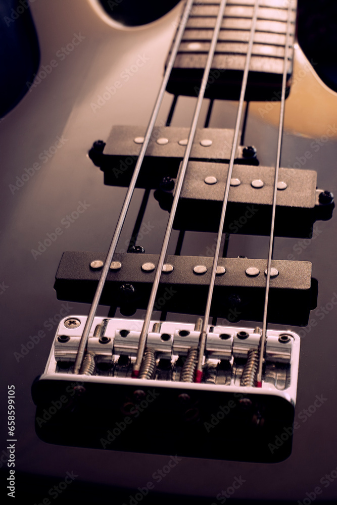 Electric bass and strings. Musical instrument background for poster ...