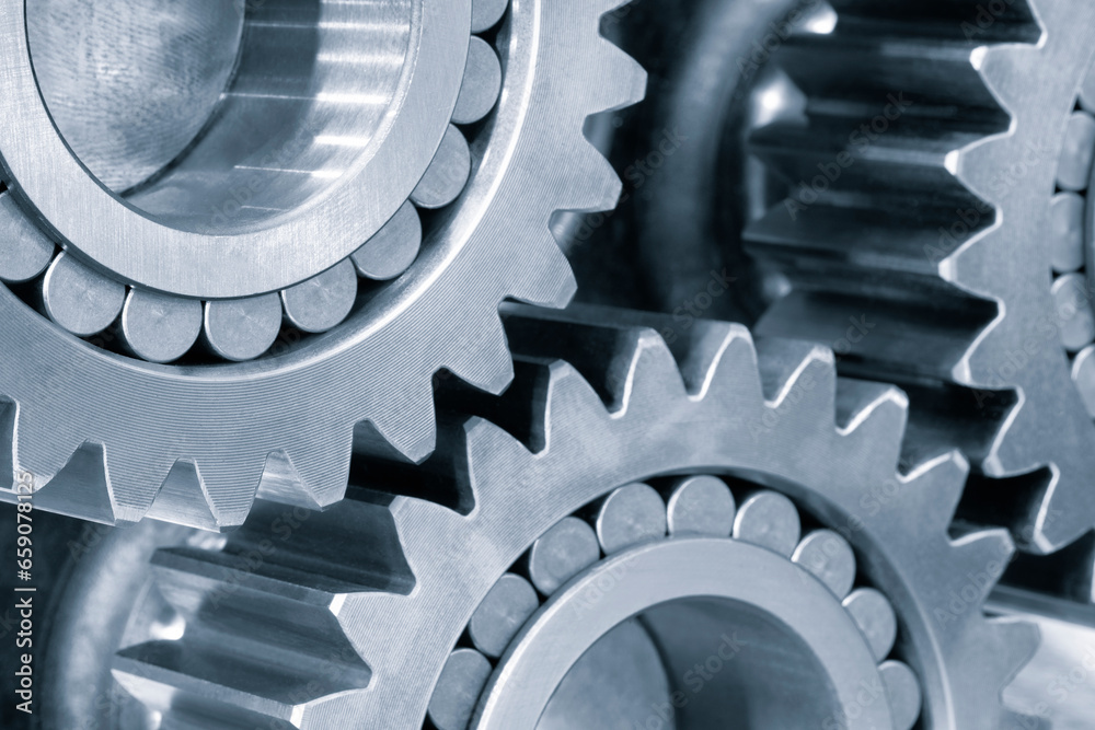 Car planetary gear with 5 satellite cog wheels in opened gearbox ...