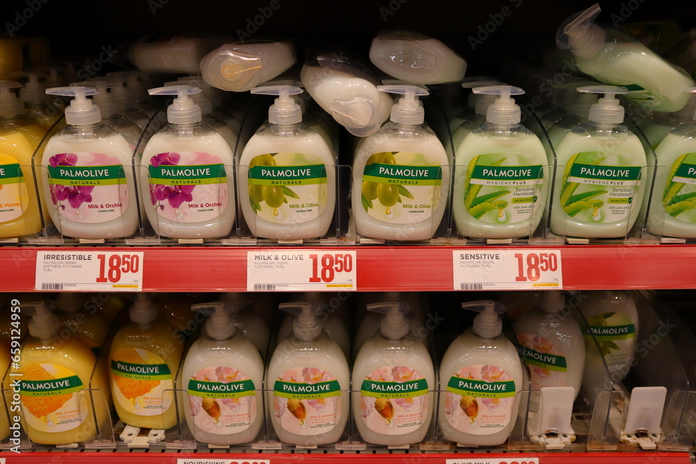 Rows of Palmolive hand soap. Inside a Swedish supermarket store. Text ...