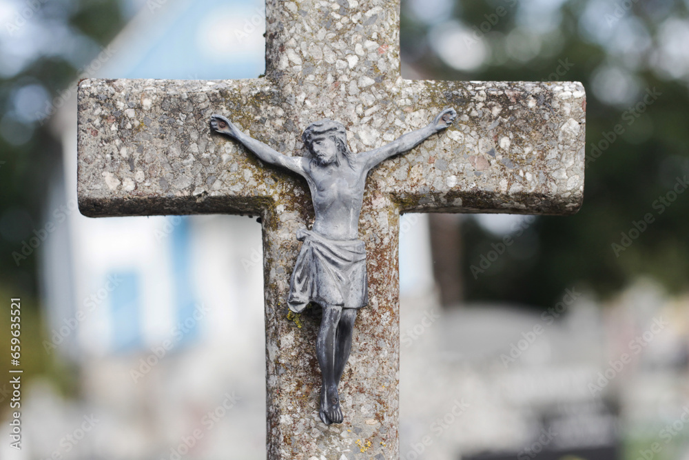 Photo Stock Jesus crucified metal statue. Weathered concrete cross. Graveyard background. Rusty ...
