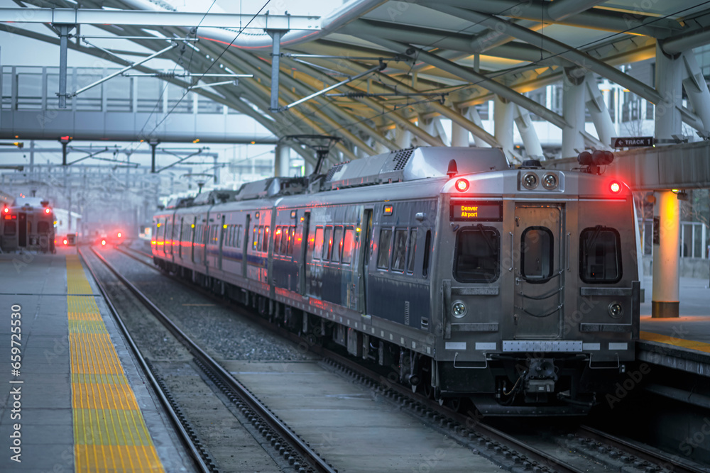 The A line light rail train departing Denver Union Station to DIA ...