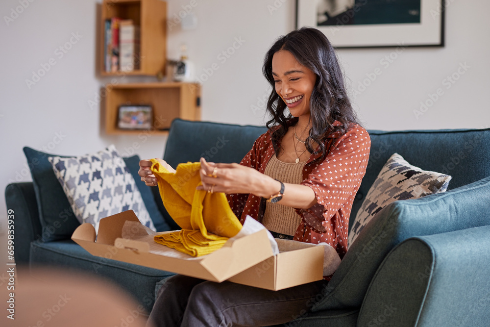 Hispanic woman opening parcel package from online shop Stock Photo ...