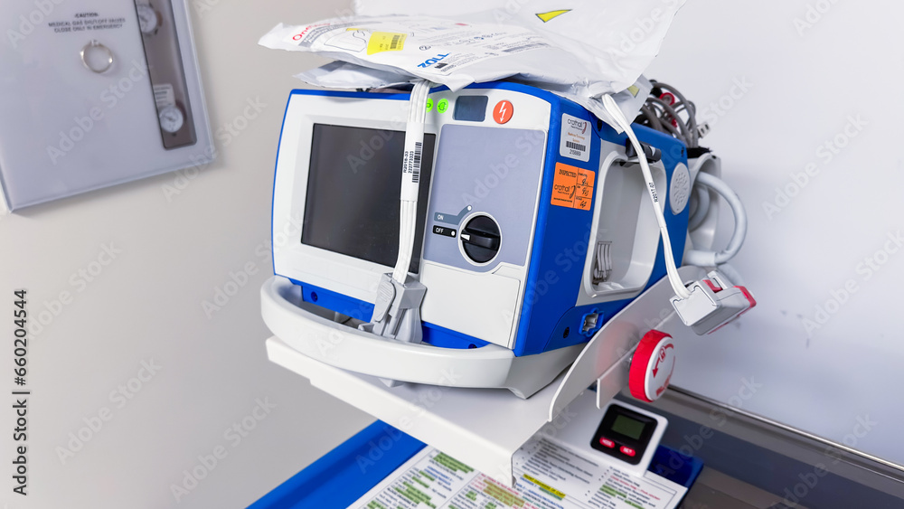 hospital defibrillator AED unit ready for action, symbolizing emergency ...