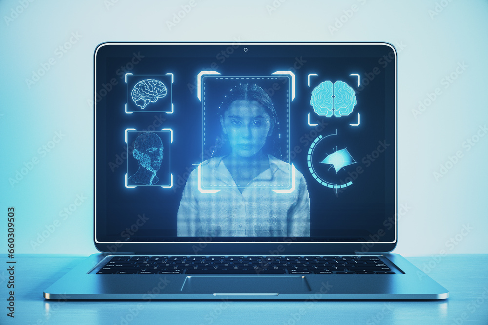 Laptop on desk with face recognition hologram on light backdrop. Face ...