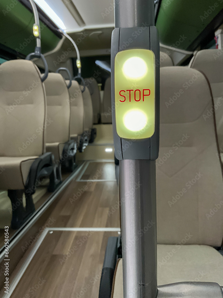 Button stop on hand rail. Stop button on city or extra-urban buses ...