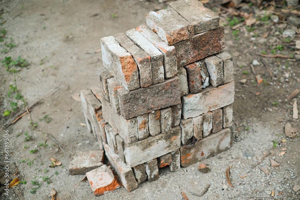 Solid clay brick used for construction, dark red brick. pile of bricks ...