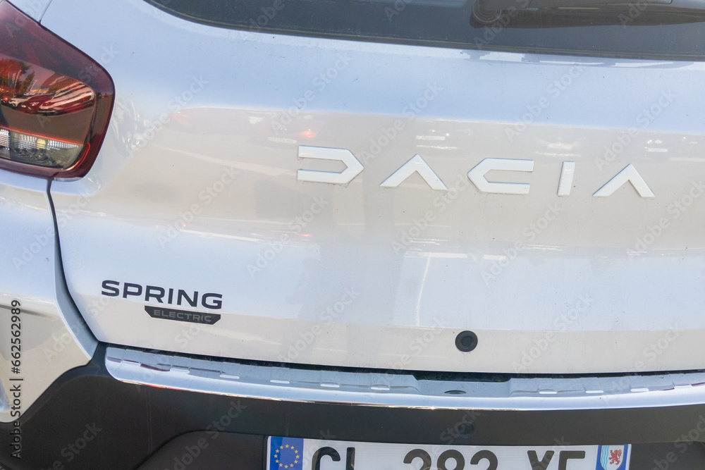 Dacia spring electric vehicle car logo brand and new text sign on back ...