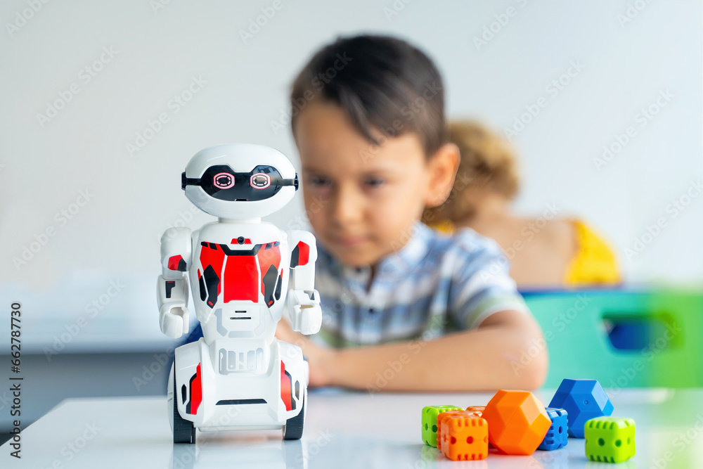 Robotics programming class. Preschool Children construct and code Robot ...