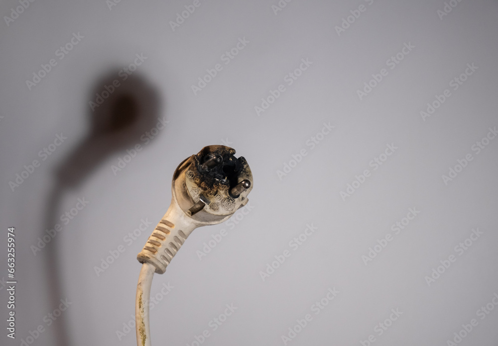 Fire wiring. electrical plug from overload. Electrical safety concept ...