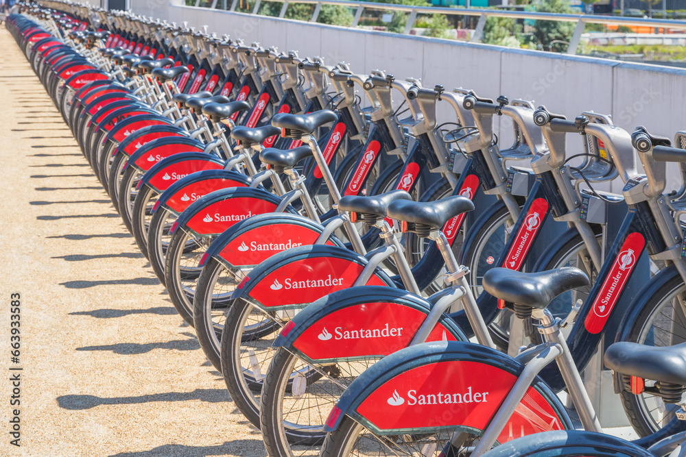 Santander Cycles bikes docked in a row at Aquatic Centre, Queen ...