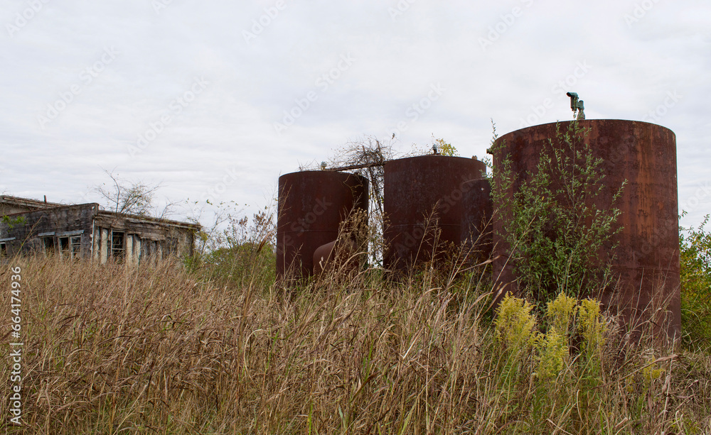 old abandoned gas station tanks and building Stock Photo | Adobe Stock