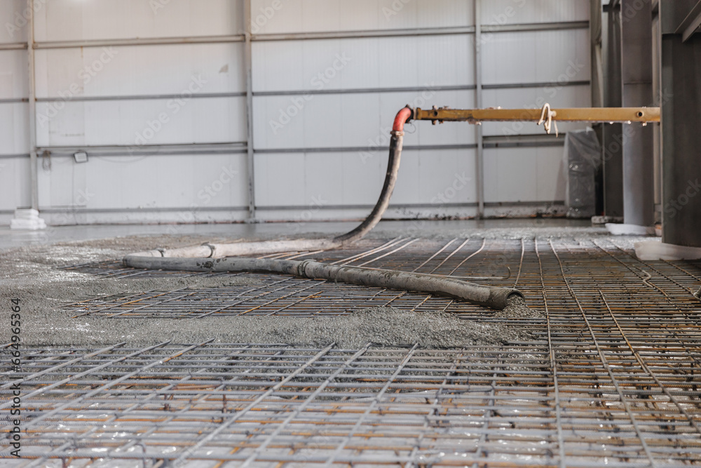 Closeup pipe of pump truck move concrete to reinforced structures ...