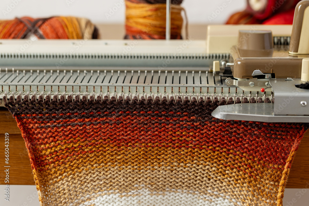 Manual knitting machine. A knitting machine is a device used to create ...