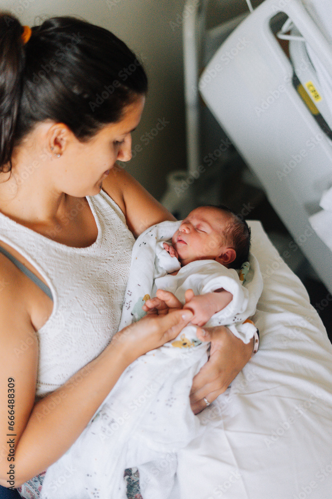 Portrait of an aunt with her one day old nephew Stock Photo | Adobe Stock