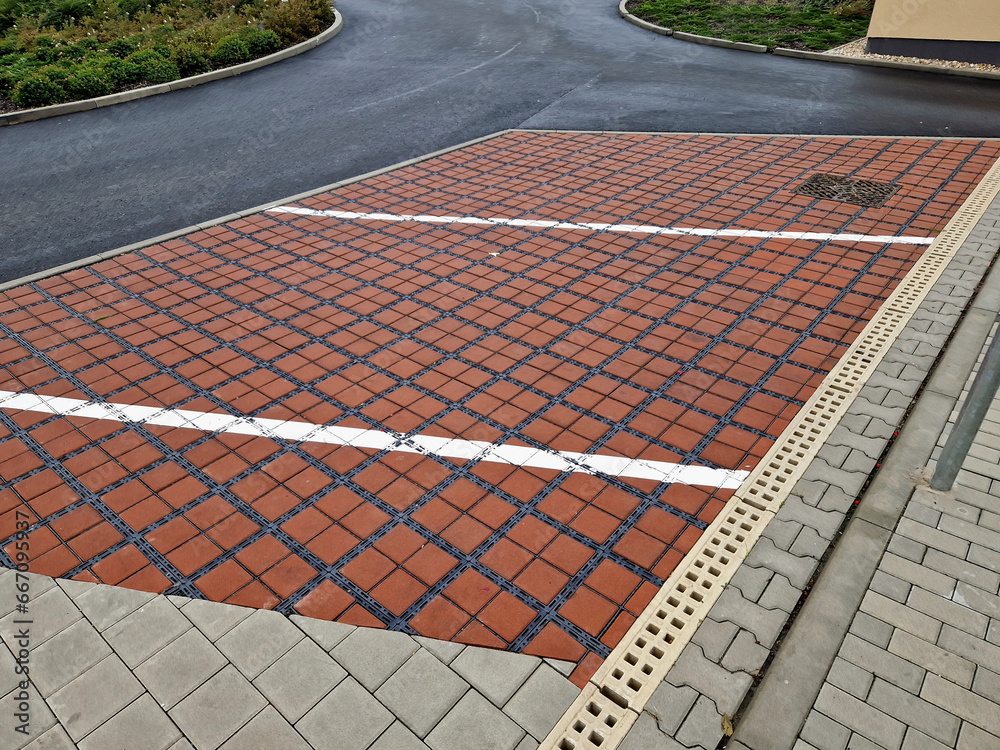 drainage paving with infiltration holes between concrete blocks in the ...