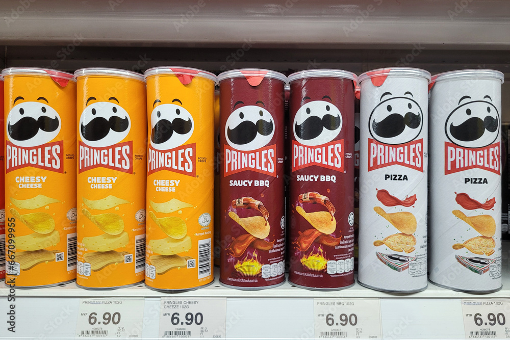 PENANG, MALAYSIA - 6 OCT 2023: Row of Pringles Snack on store shelf in ...