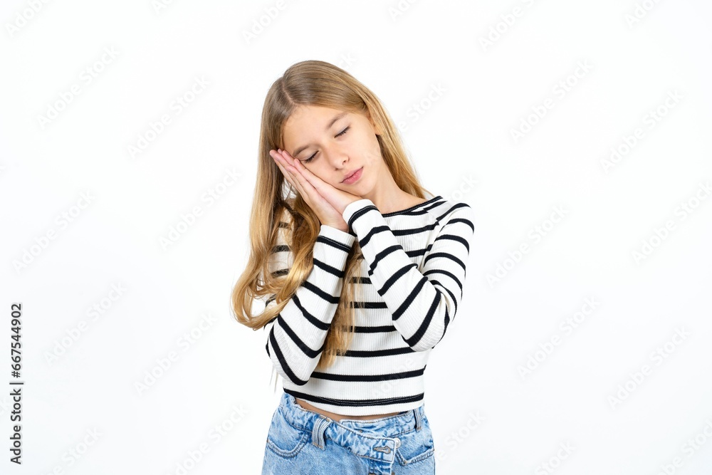 Beautiful teen girl sleeping tired dreaming and posing with hands ...