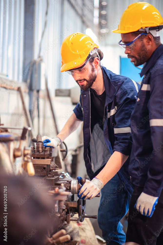 Portrait of Heavy industry workers working on the metal fabrication ...