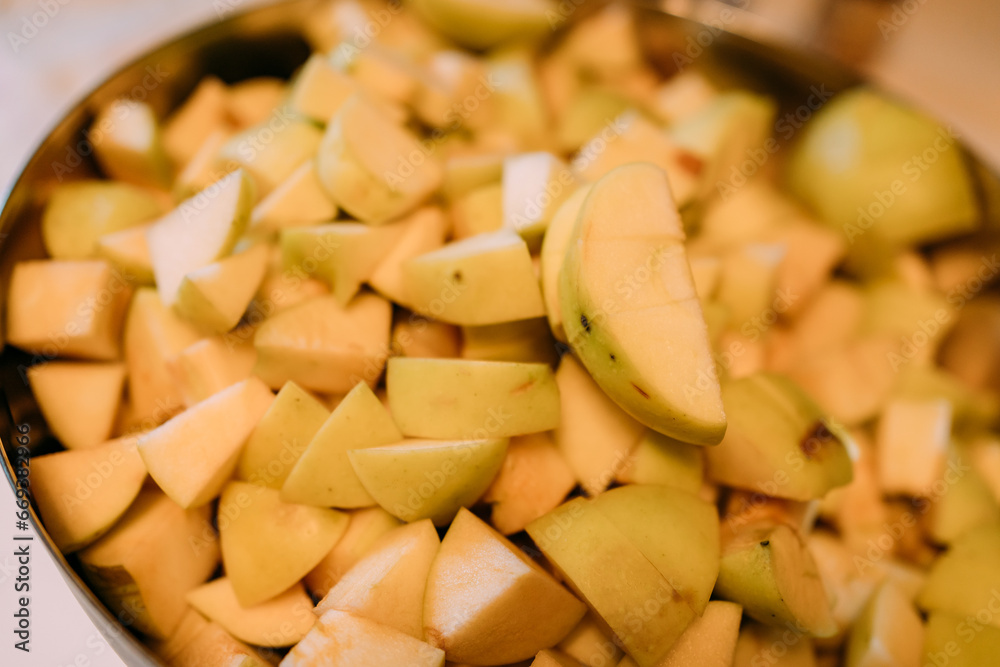 Cubes of apples in a plate. Lots of apples for jam, charlotte or ...
