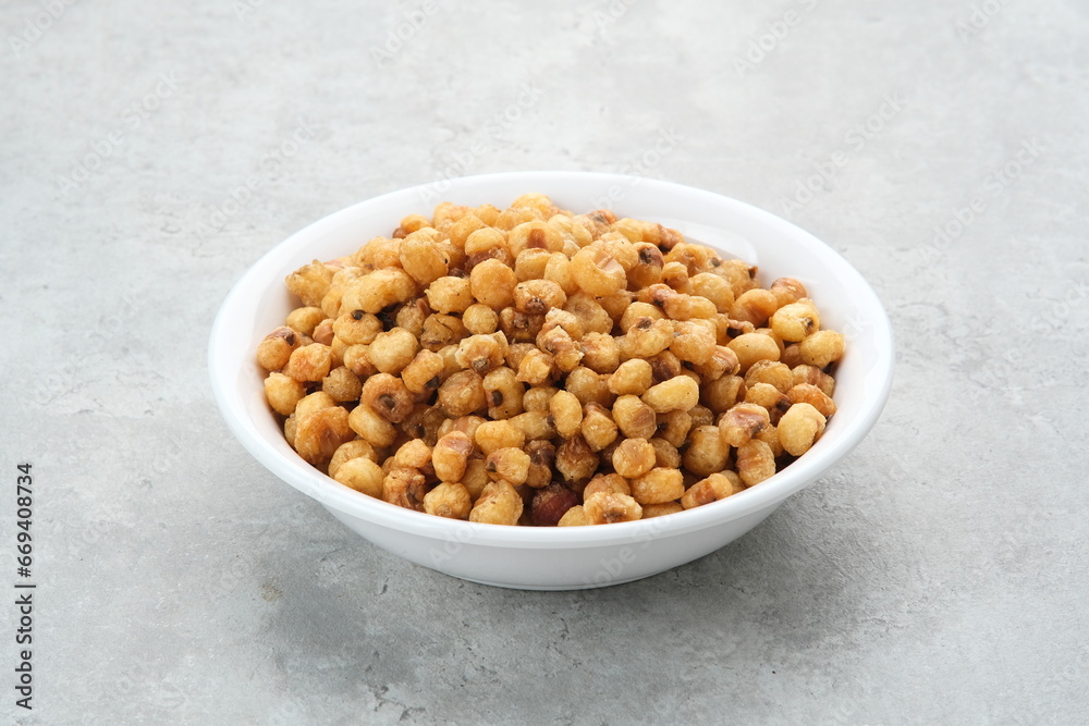 Marning, heap of crispy roasted corn kernels, traditional snack from ...