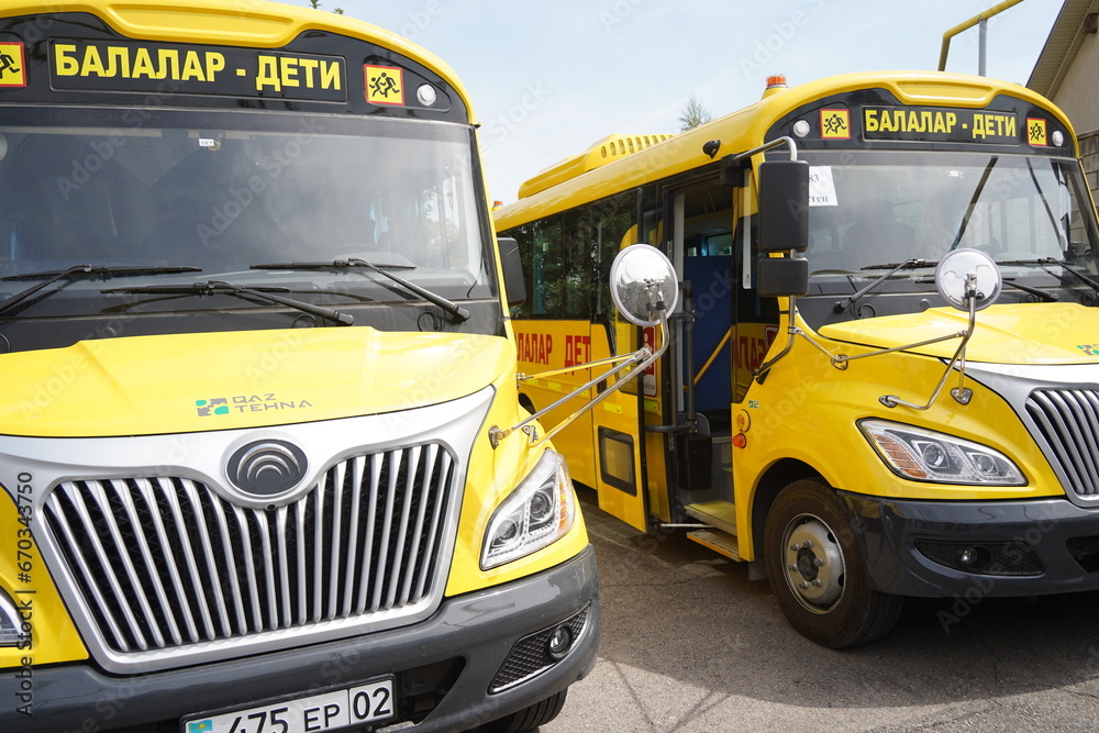 Almaty, Kazakhstan - 09.06.2023 : A yellow school bus with the ...