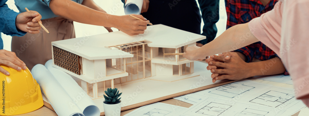 Architect team analysis and brainstorming about house construction at ...