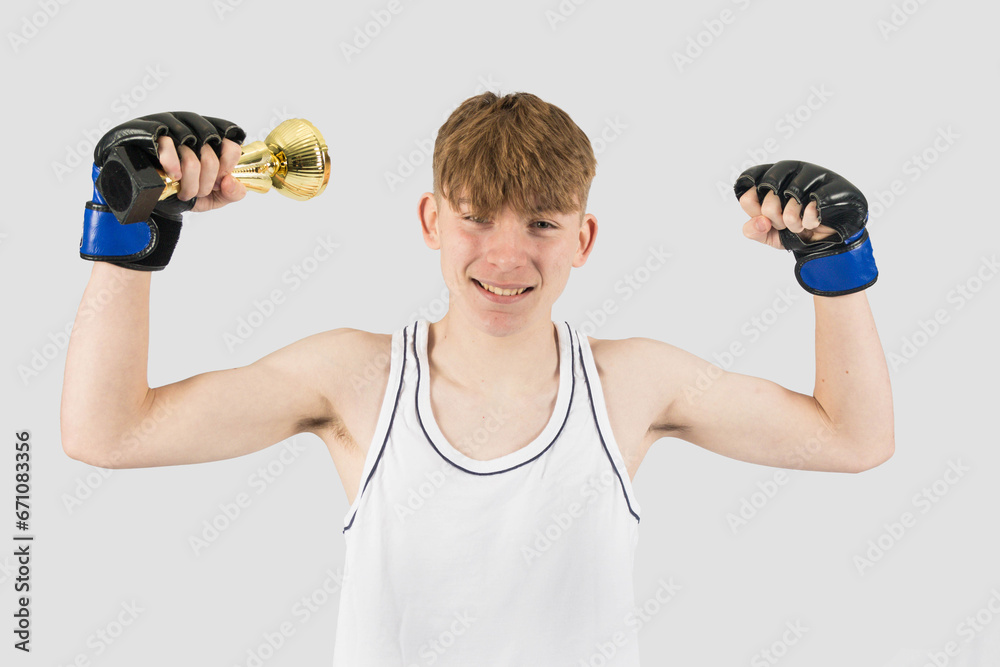 Teenage boxer boy with a trophy Stock Photo | Adobe Stock