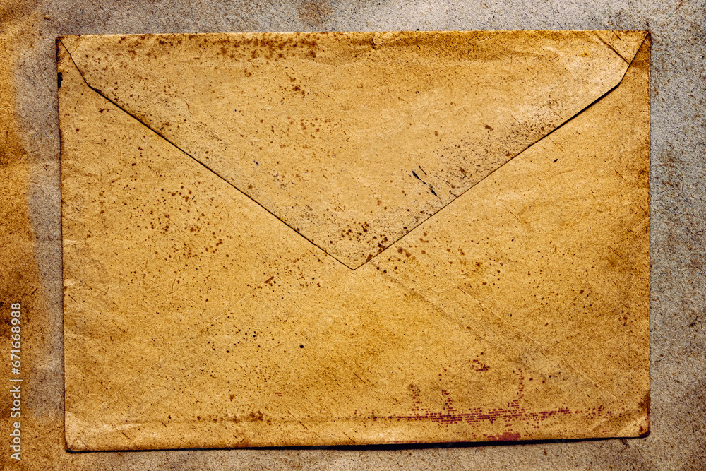 front view closeup of blank old aged closed letter paper envelope with ...