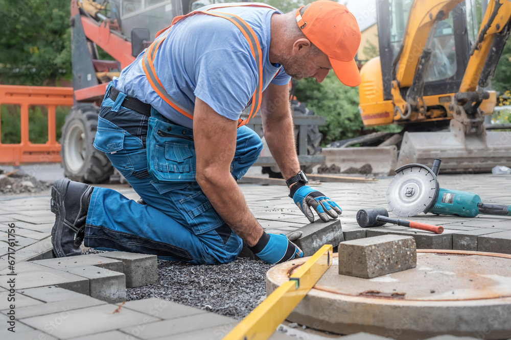Laying Interlocking Paving A Worker S Hand Is Placing Interlocking