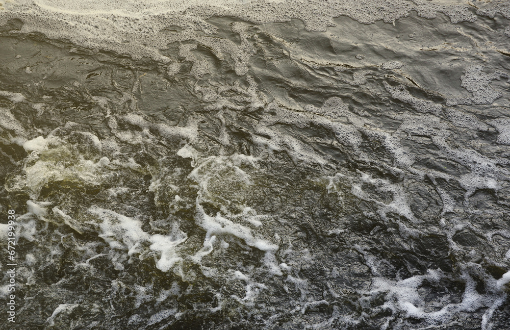 Waves of water of the river and the sea meet each other during high ...