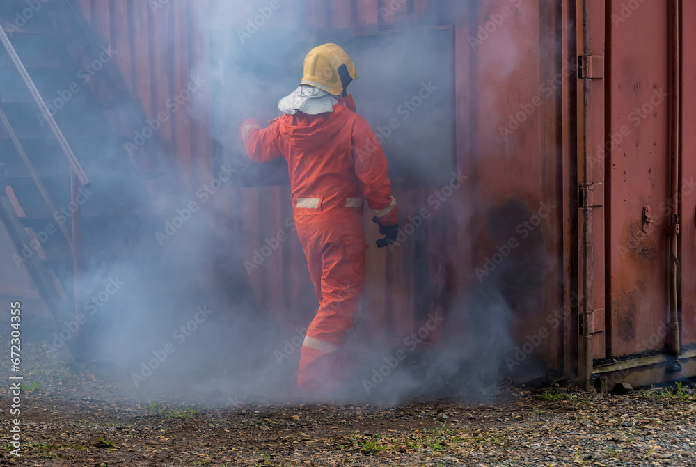 Firefighter to save girl in fire and smoke. Rescue Team or Firefighters ...