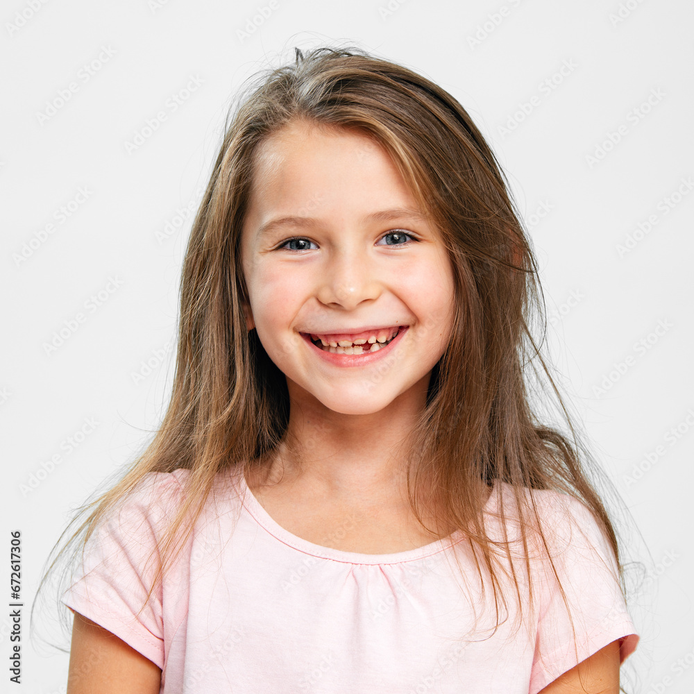 Cute cheerful child smiles without a tooth. The little girl smiles. The ...