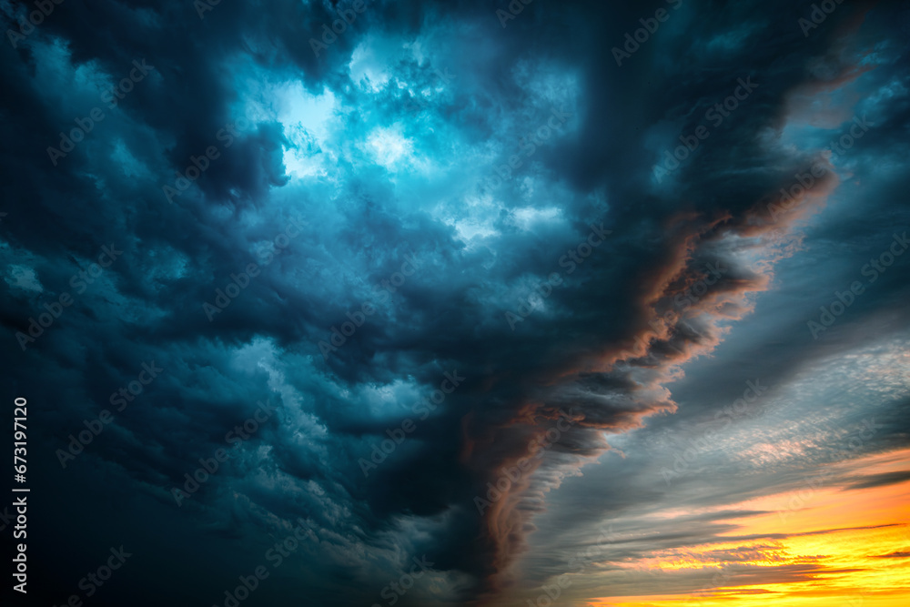The typhoon is born, a tornado in a stormy dark sky with black clouds ...