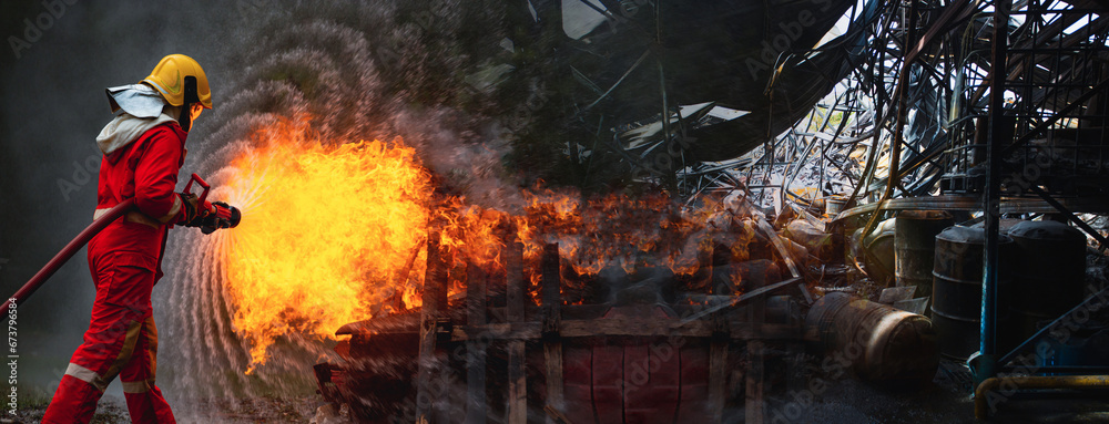 Stock-Foto „Burning oil refinery, Fireman water spray by high pressure ...