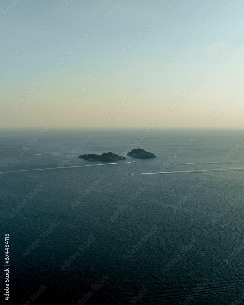 Aerial view of Li Galli islands at sunset along the Amalfi coastline on ...