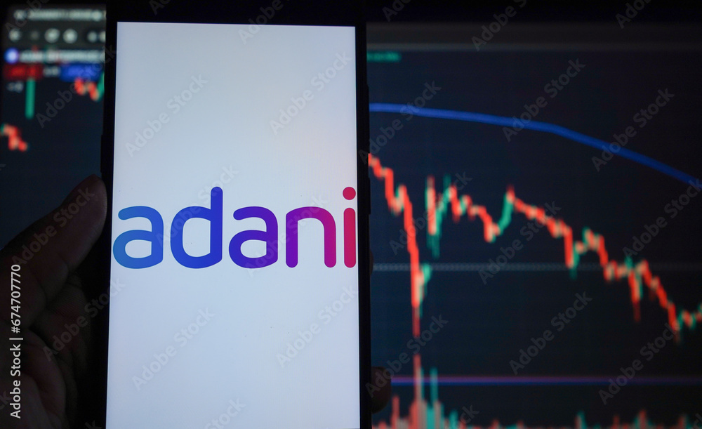 Adani logo with negative stock market logo in background Stock Photo ...