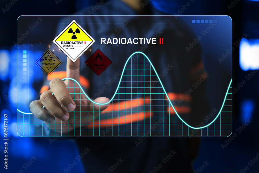Engineer hand pointing on touchscreen with radioactive label dangerous ...